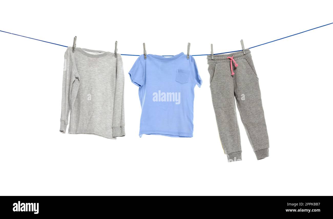Different clothes drying on washing line against white background Stock ...