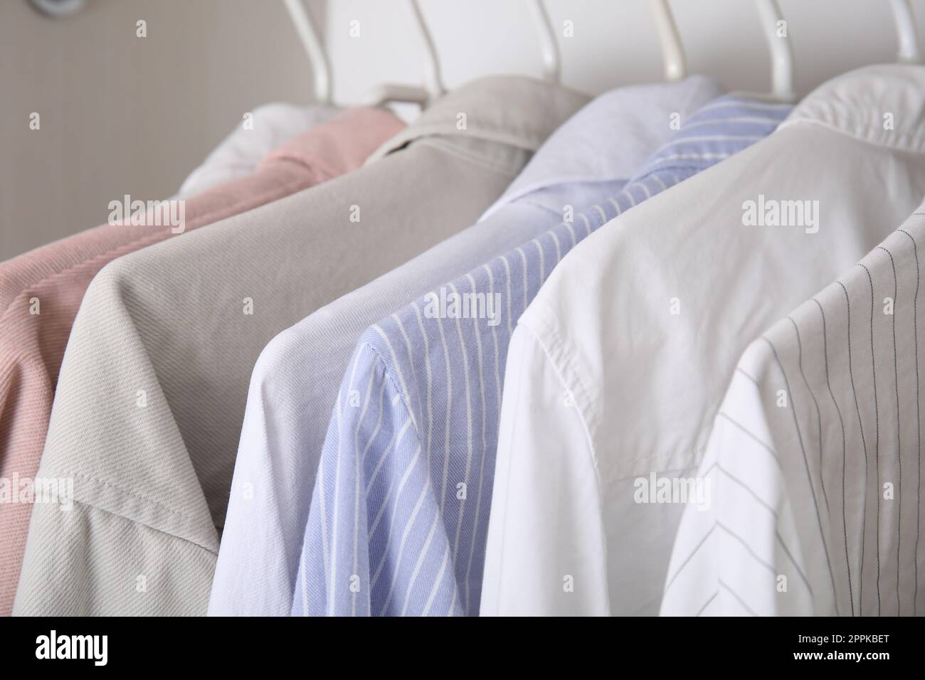 Collection of clothes in wardrobe, closeup view Stock Photo - Alamy
