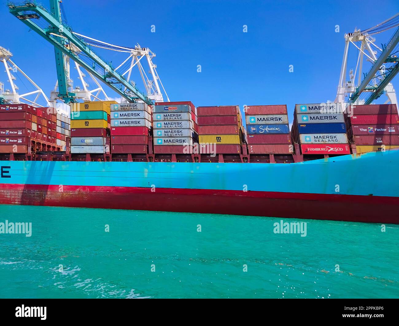 Container ship at Port Miami, one of the largest cargo ports in the US ...