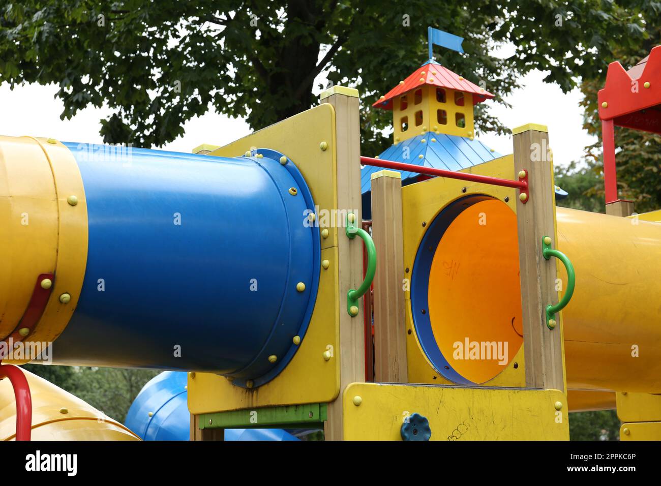 Slides on childrens playground hi-res stock photography and images - Alamy