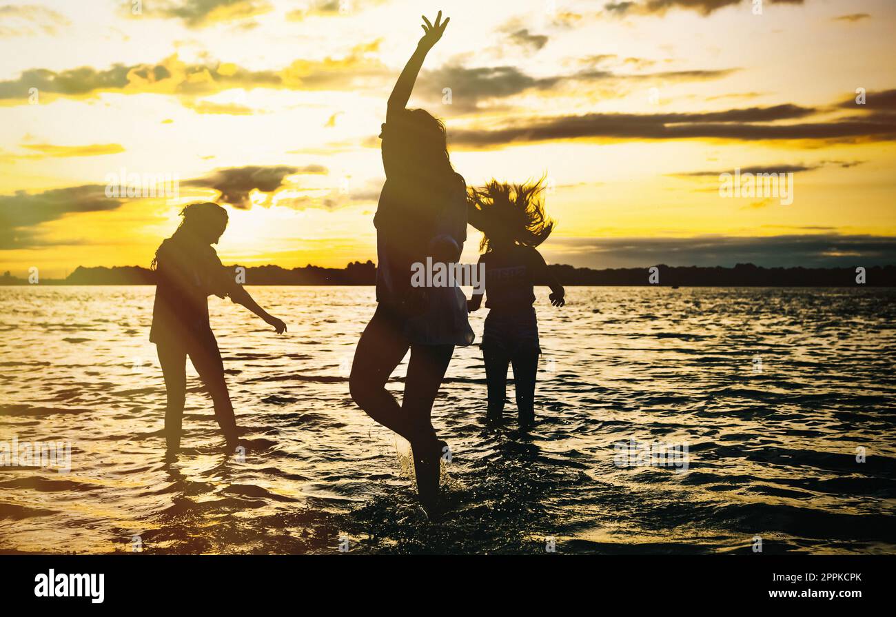 Happy people group celebrate jump for good life on weekend concept for win victory, person faith ...