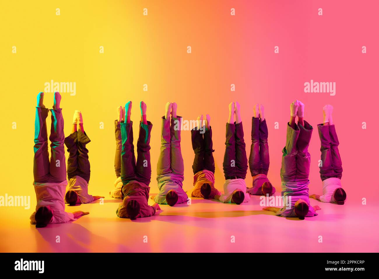 Group of pretty teenage girls wearing white t-shirt and jeans dancing ...