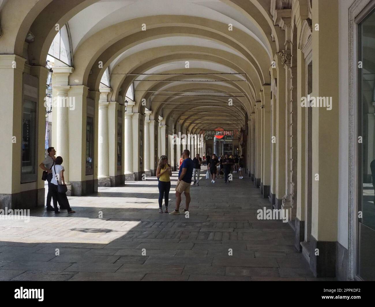 People in Piazza San Carlo square arcades in Turin Stock Photo - Alamy