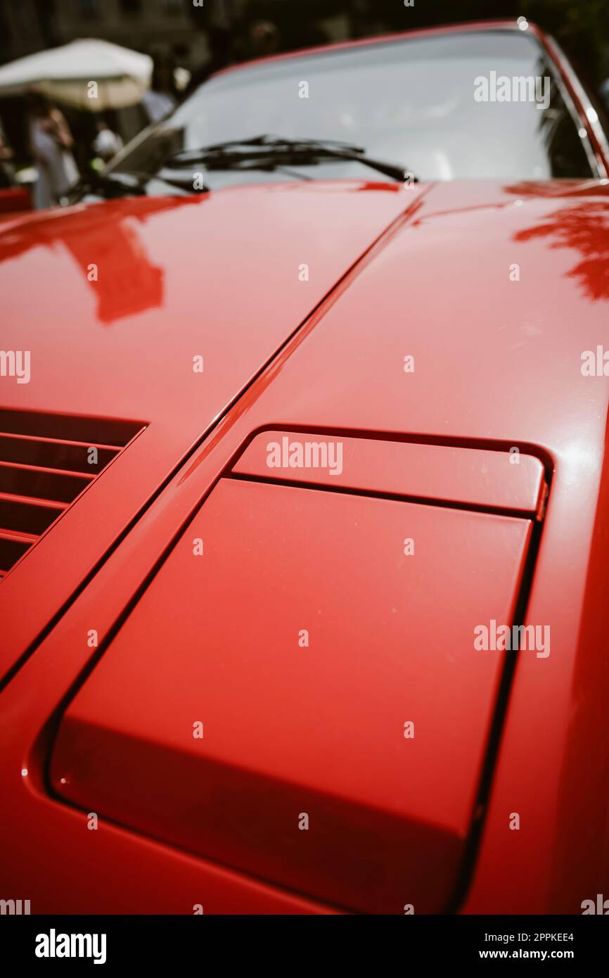 Vintage red car with hidden headlights Stock Photo - Alamy