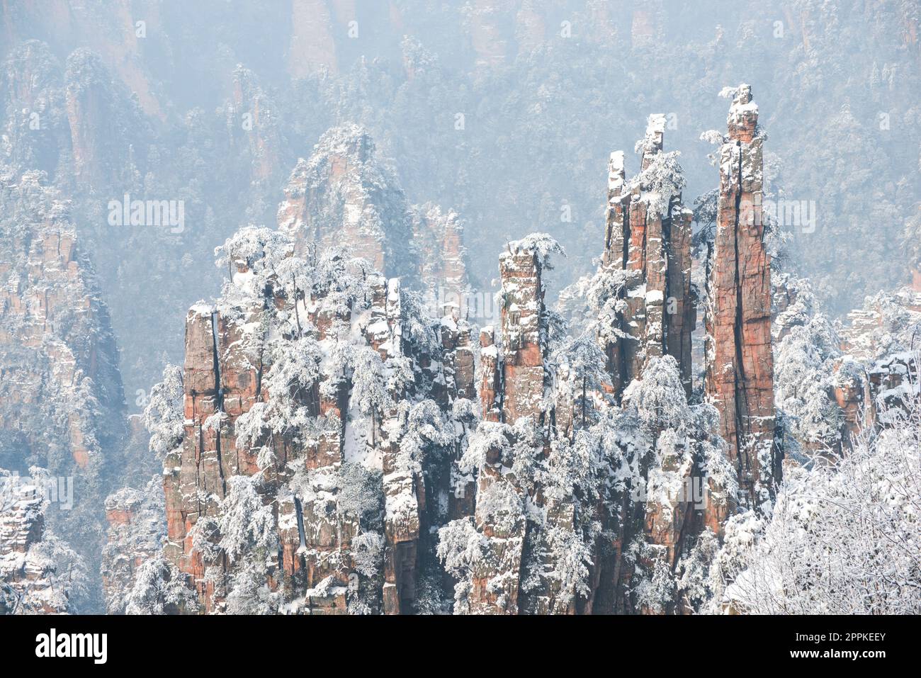 Karst hills in snow Stock Photo - Alamy