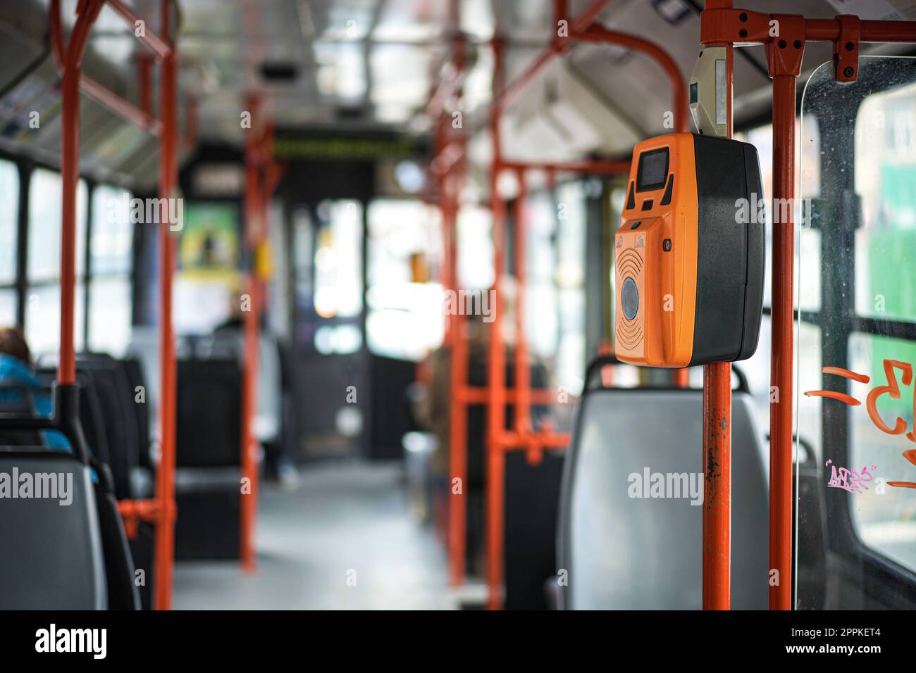 Ticket validator inside a public transportation bus Stock Photo - Alamy