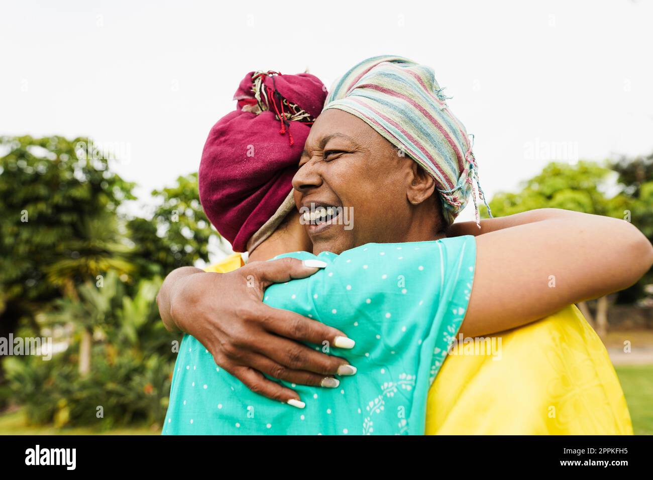 African women hugging each others outdoor - Culture, love and ...