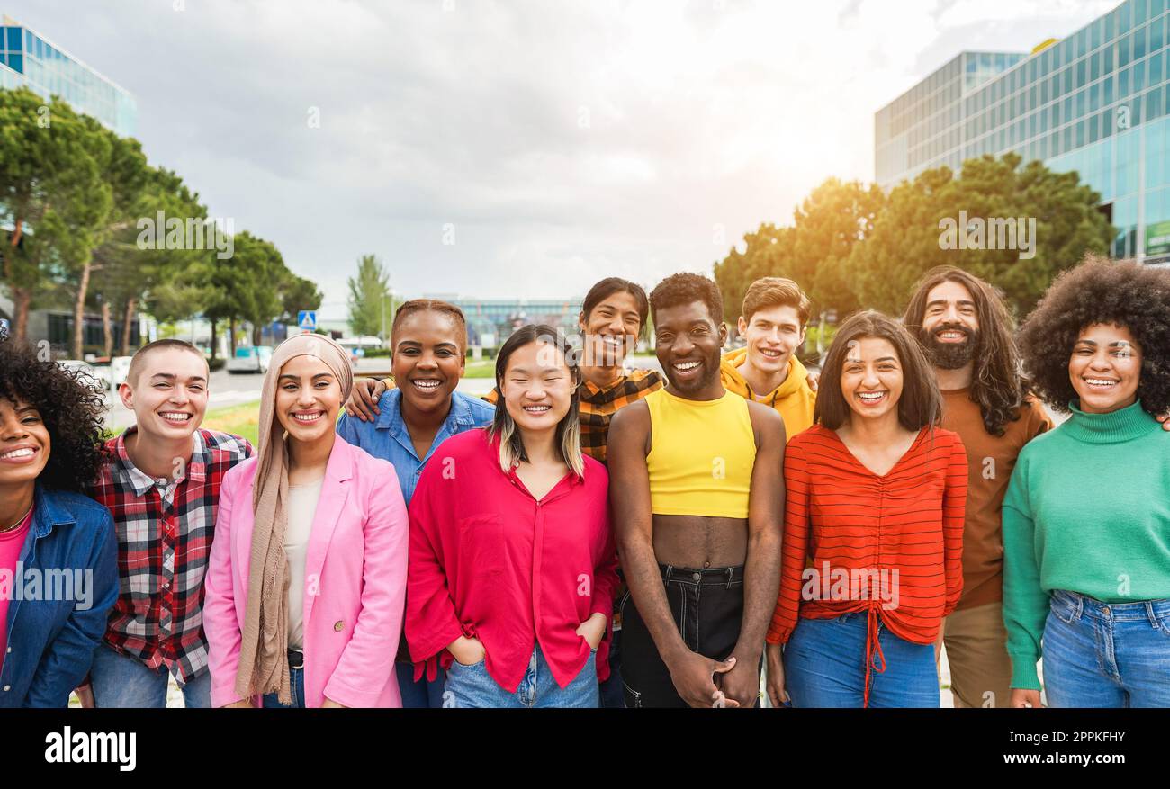 Young diverse people having fun outdoor - Focus on asian girl face ...