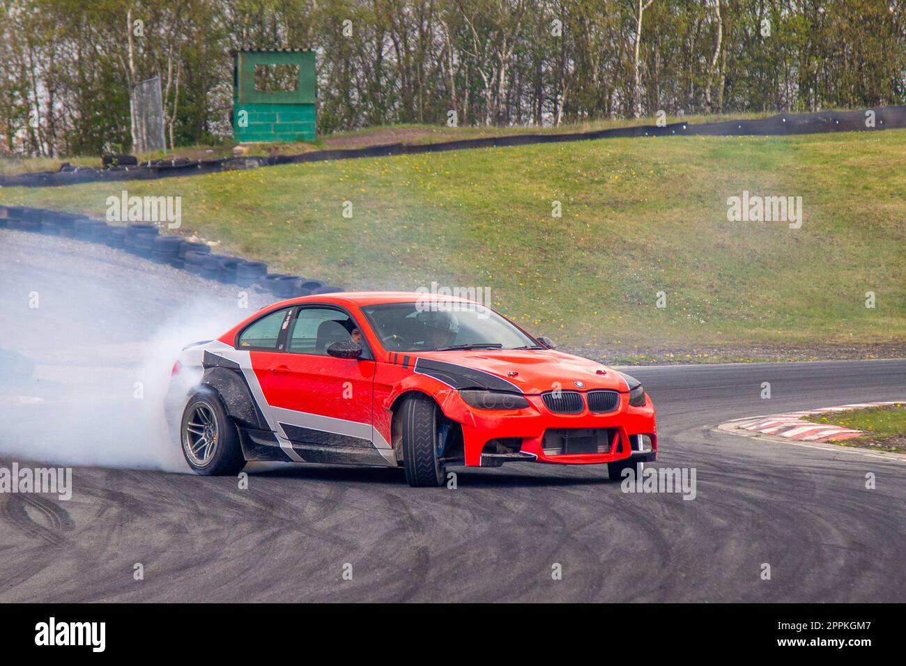 BMW burning rubber with tires screeching at Three 3 Sisters Race ...