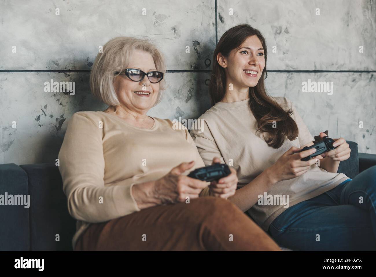 Video games competition in family between two women from different ...