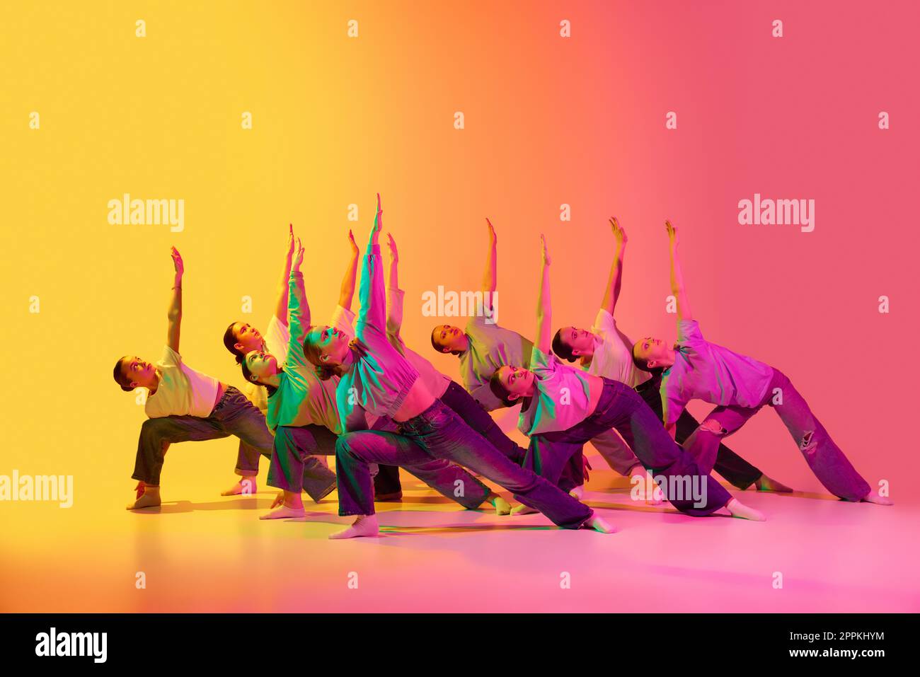 Group of beautiful teenage girls wearing white t-shirt and jeans ...