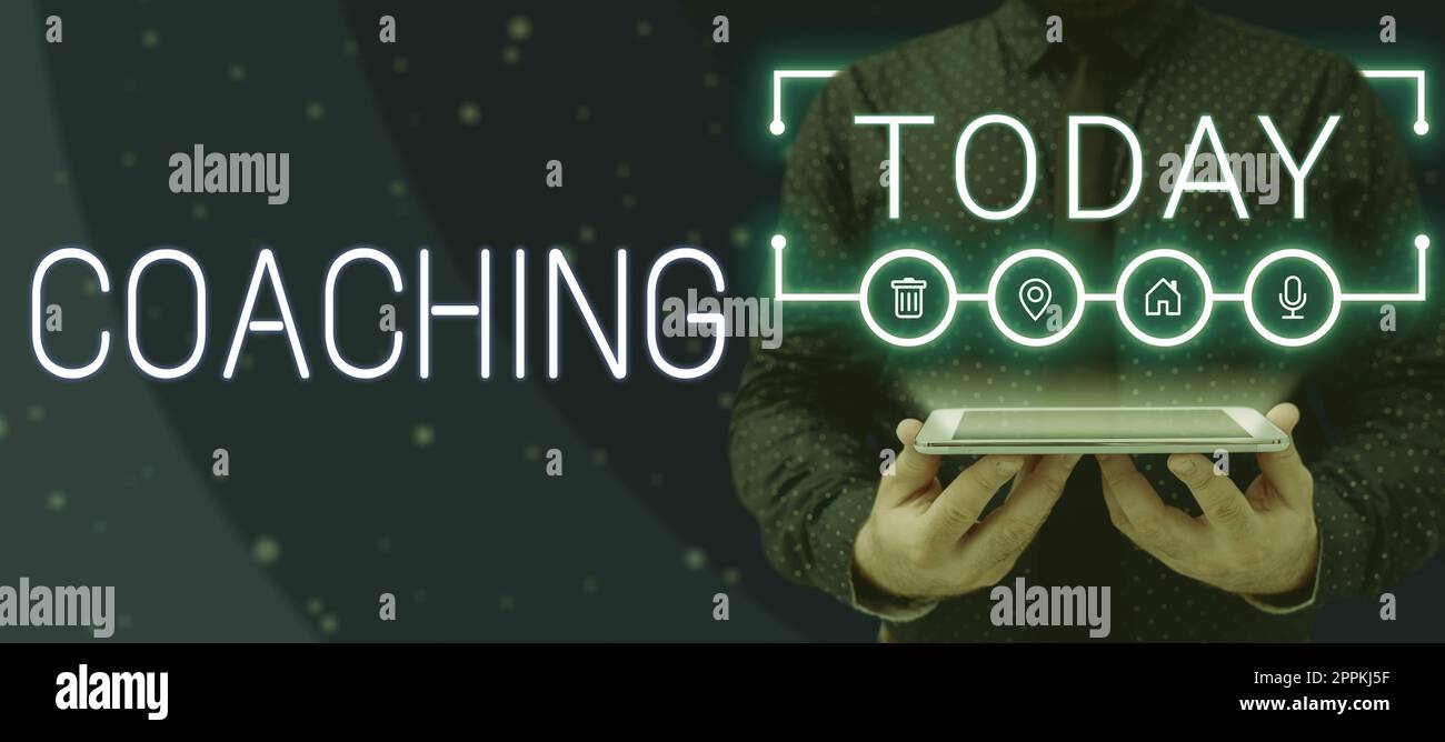 Hand writing sign Coaching. Business overview unlocking a persons ...