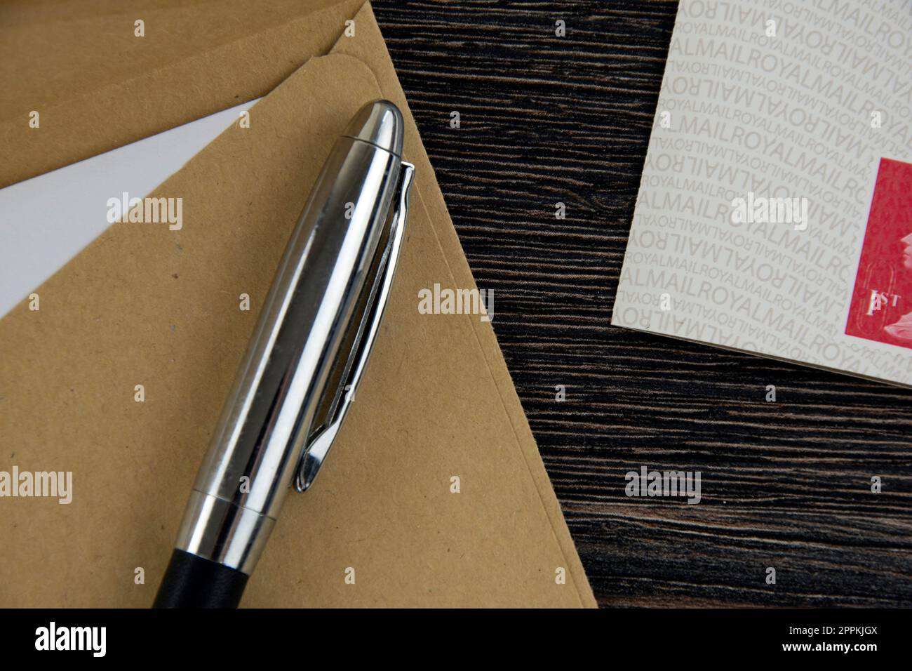 Brown paper package stamps hi-res stock photography and images - Alamy