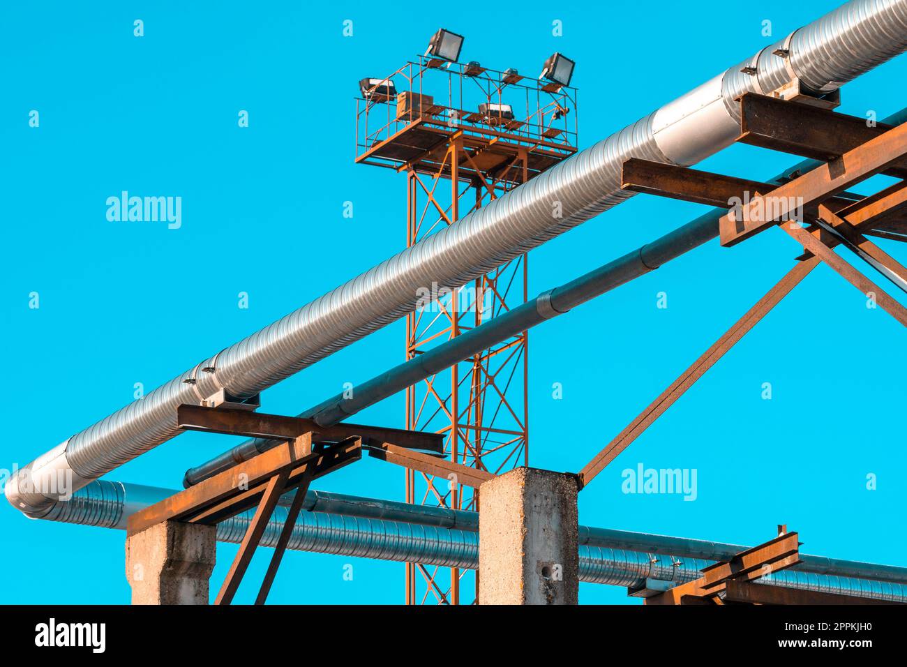 Bottom shot of a pipeline on sky background. Pipeline transportation is ... Bottom shot of a pipeline on sky background. Pipeline transportation is ...