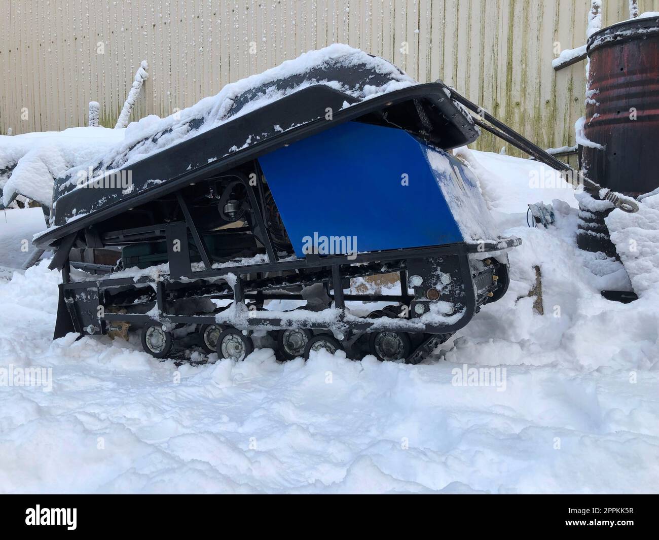 snowmobile with sled in the snow Stock Photo - Alamy
