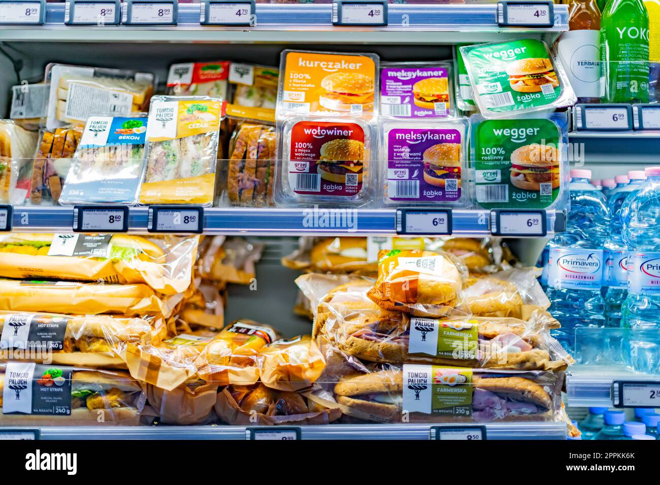 Pre-packaged foods displayed in a commercial refrigerator Stock Photo ...