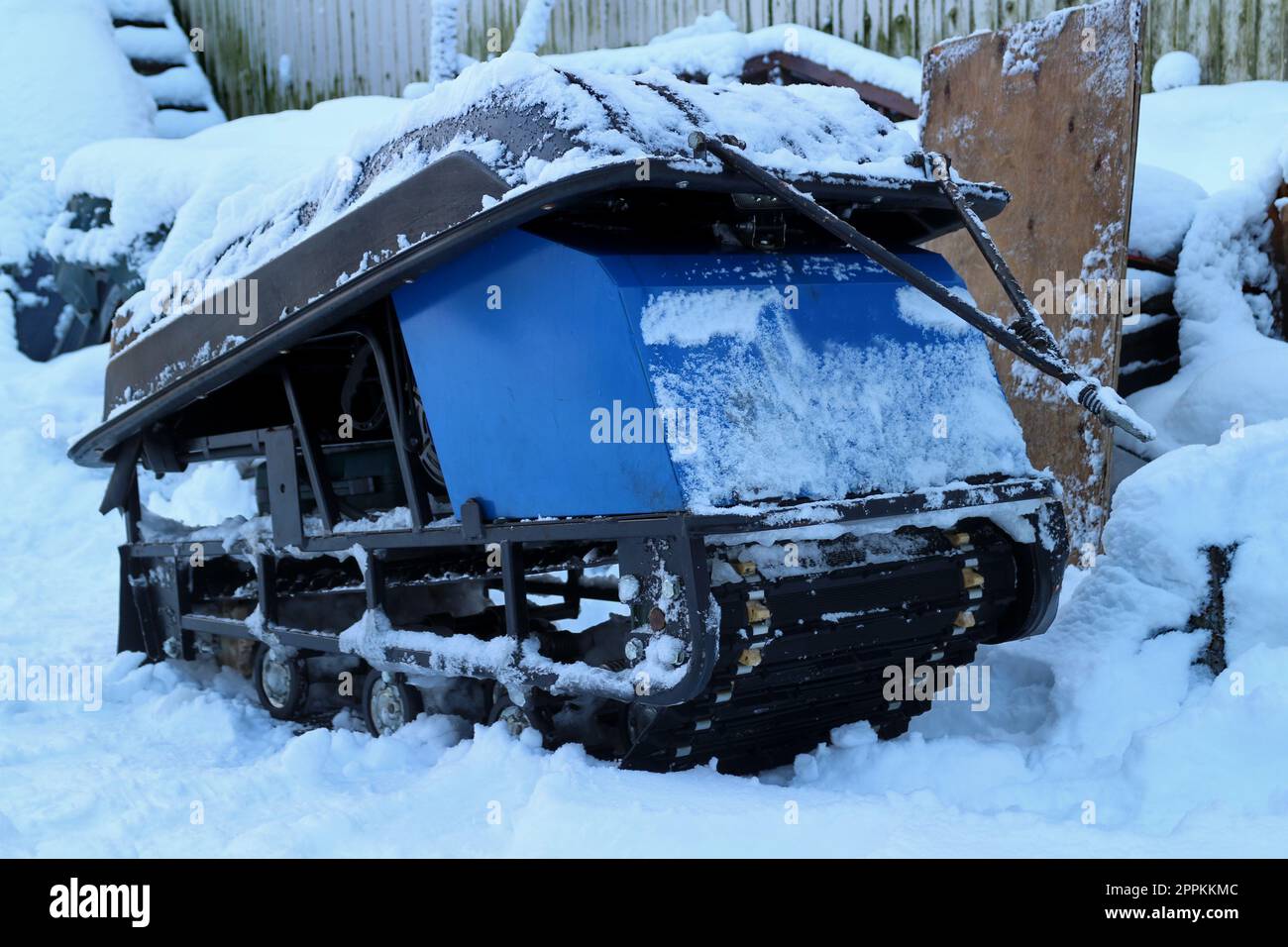snowmobile with sled in winter Stock Photo - Alamy