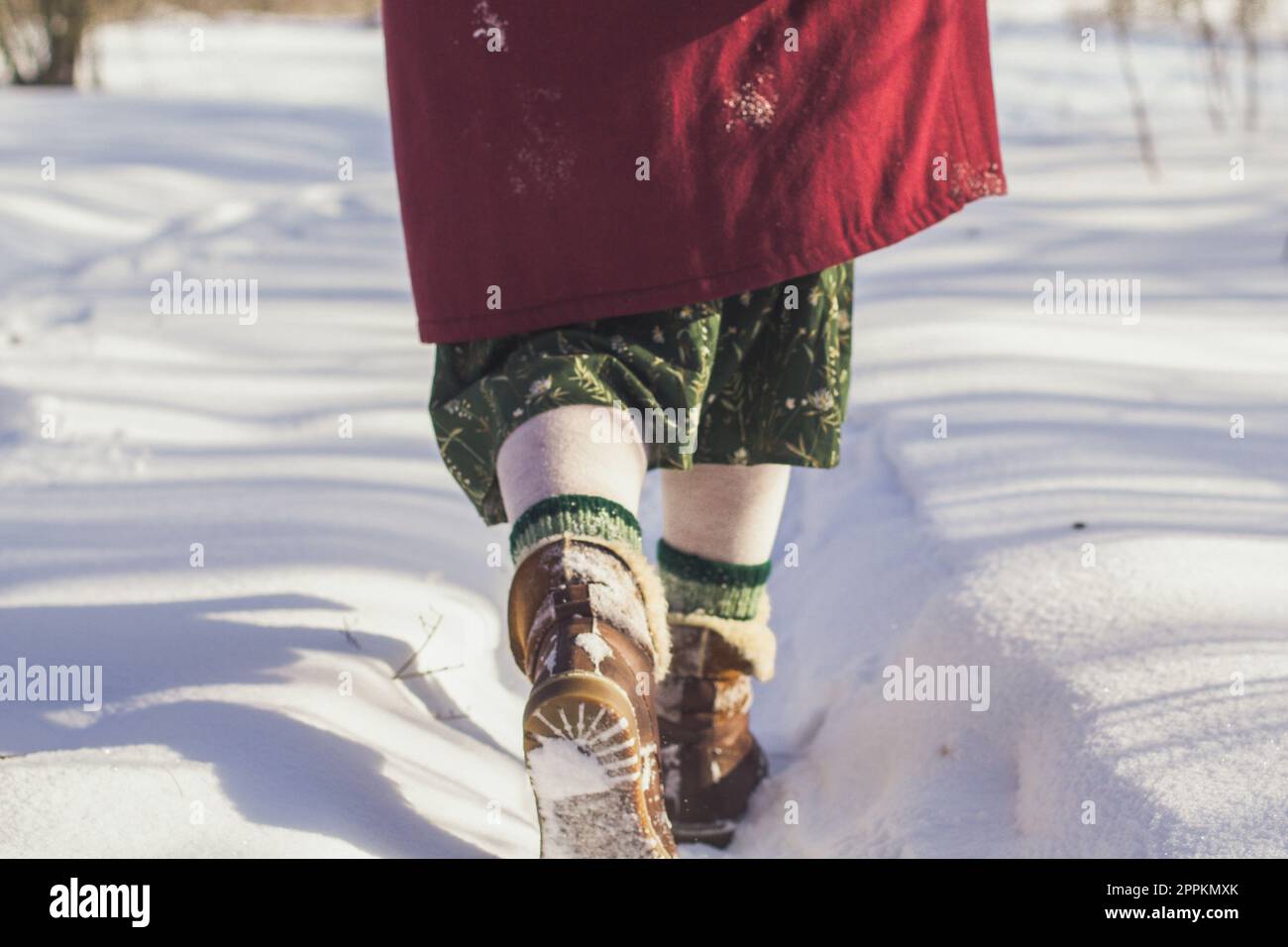 Close up legs in snow concept photo Stock Photo - Alamy