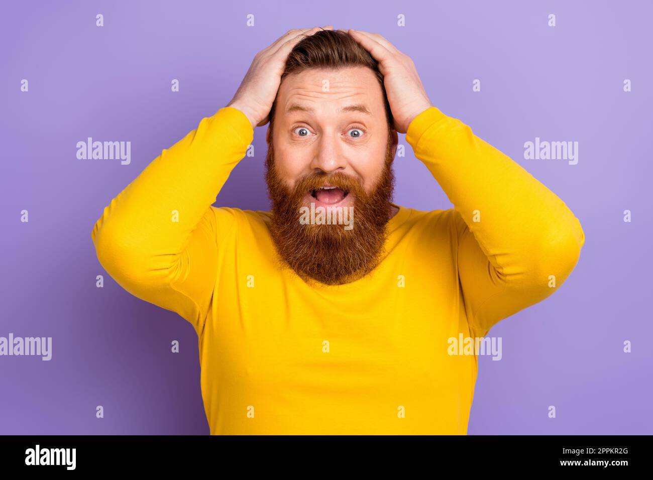 Photo of young confused guy wear yellow pullover hands head open mouth ...