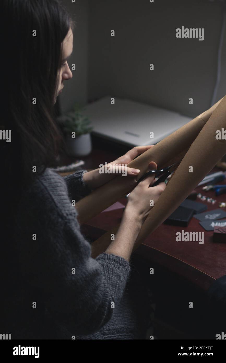 Close up wrapping process concept photo Stock Photo - Alamy