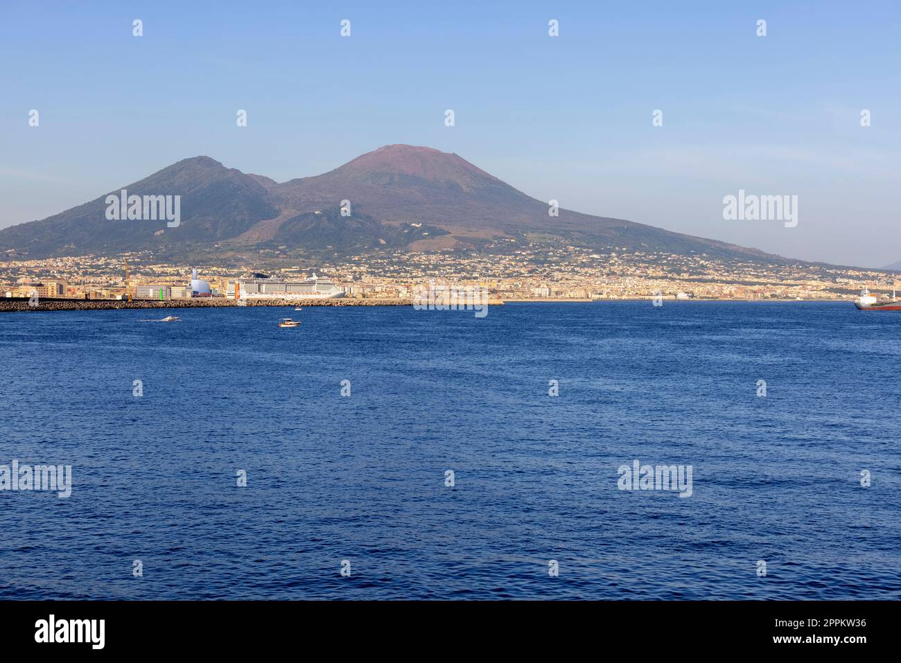 A picturesque view of the Mount Vesuvius volcano and coast and the port ...