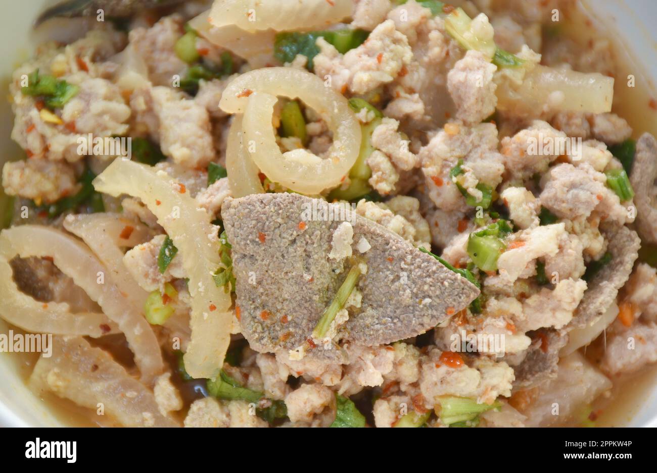 Thai spicy chop pork and slice skin with liver salad on bowl Stock ...