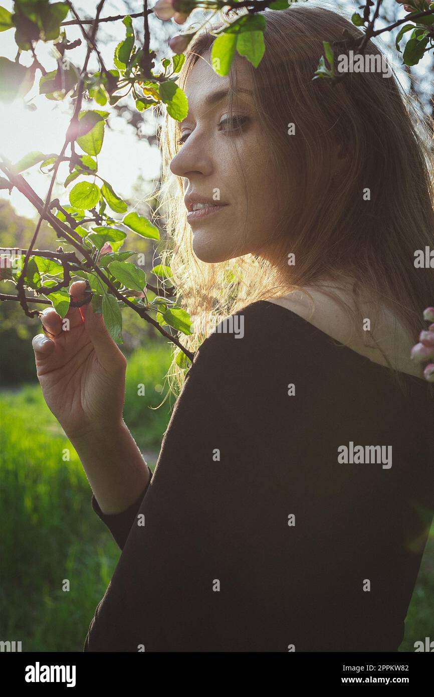 Close up smiling woman looking over shoulder portrait picture Stock ...