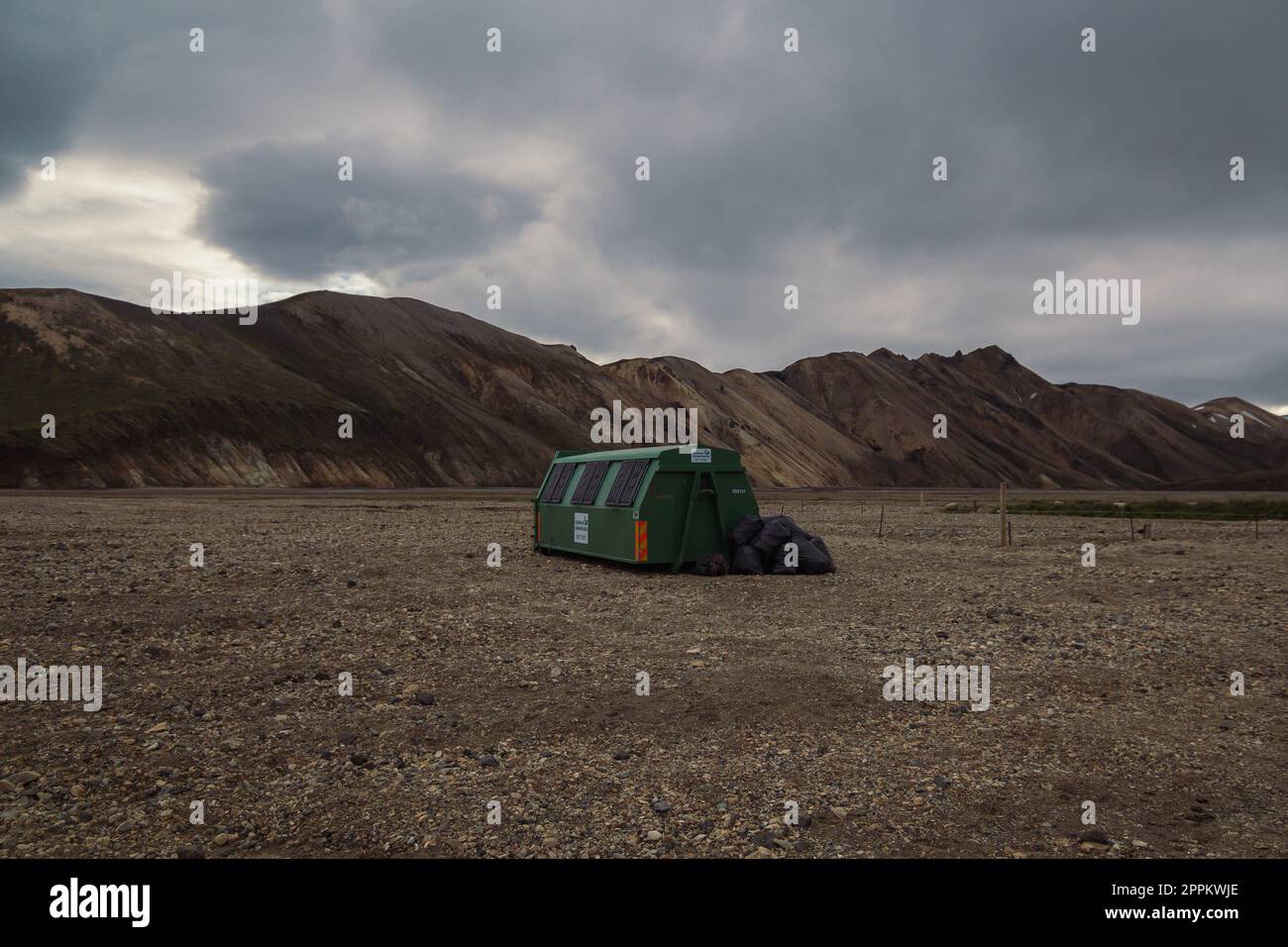 Trash bin at highland camp landscape photo Stock Photo - Alamy