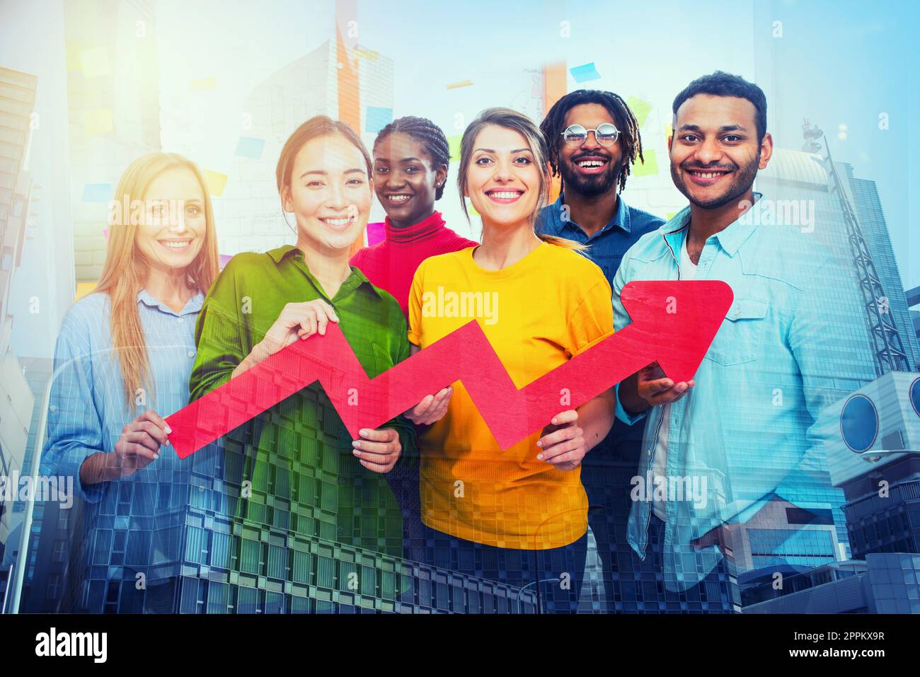 Young happy and colorful business team hold a red statistical arrow ...