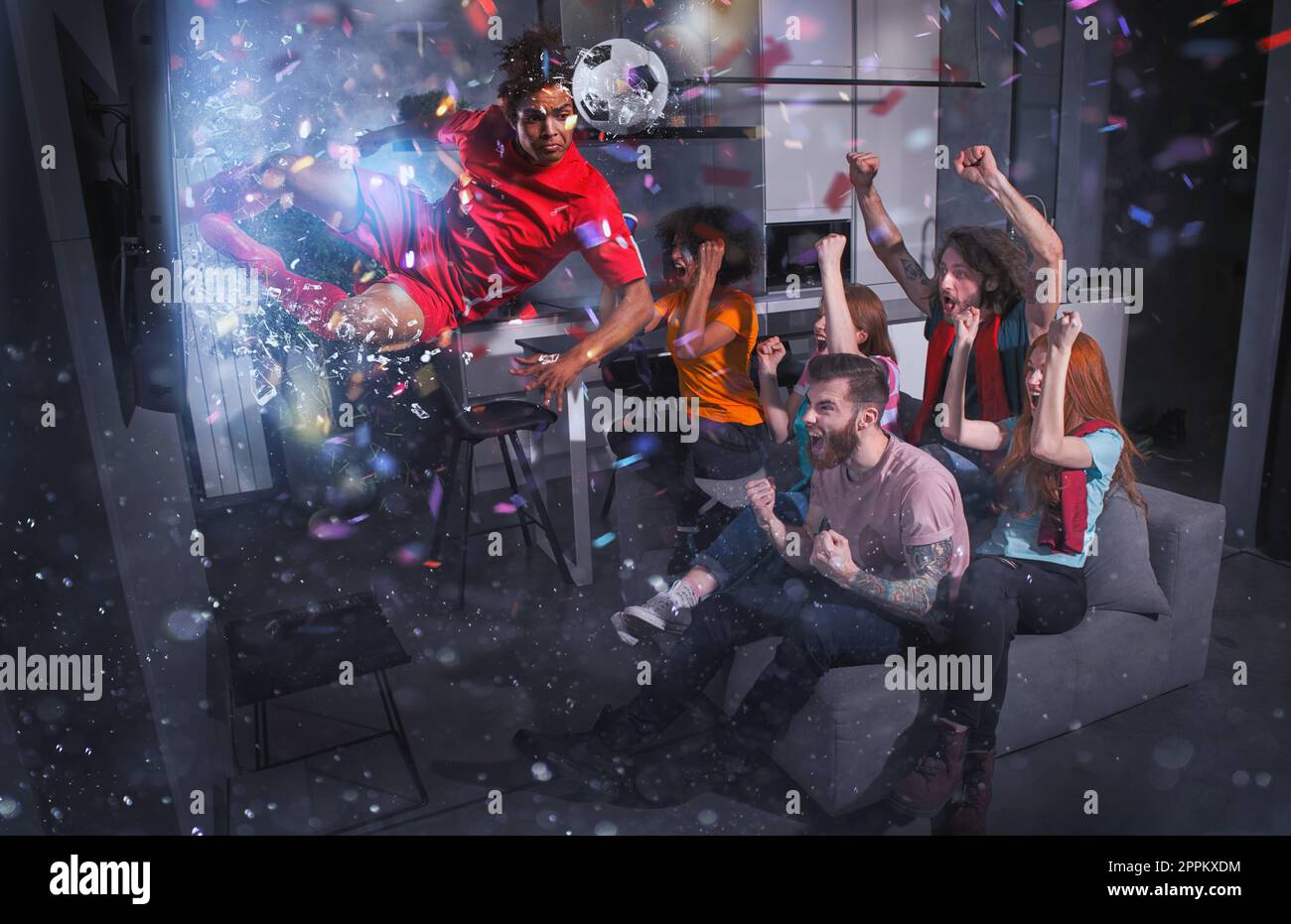 Group of friends watch a football match on television with a soccer ...