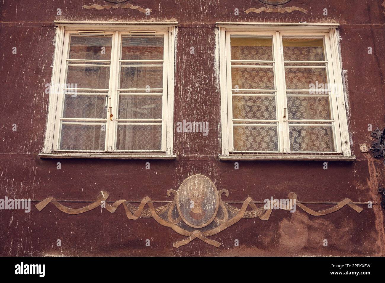 Vintage female portrait under building windows exterior photo Stock ...