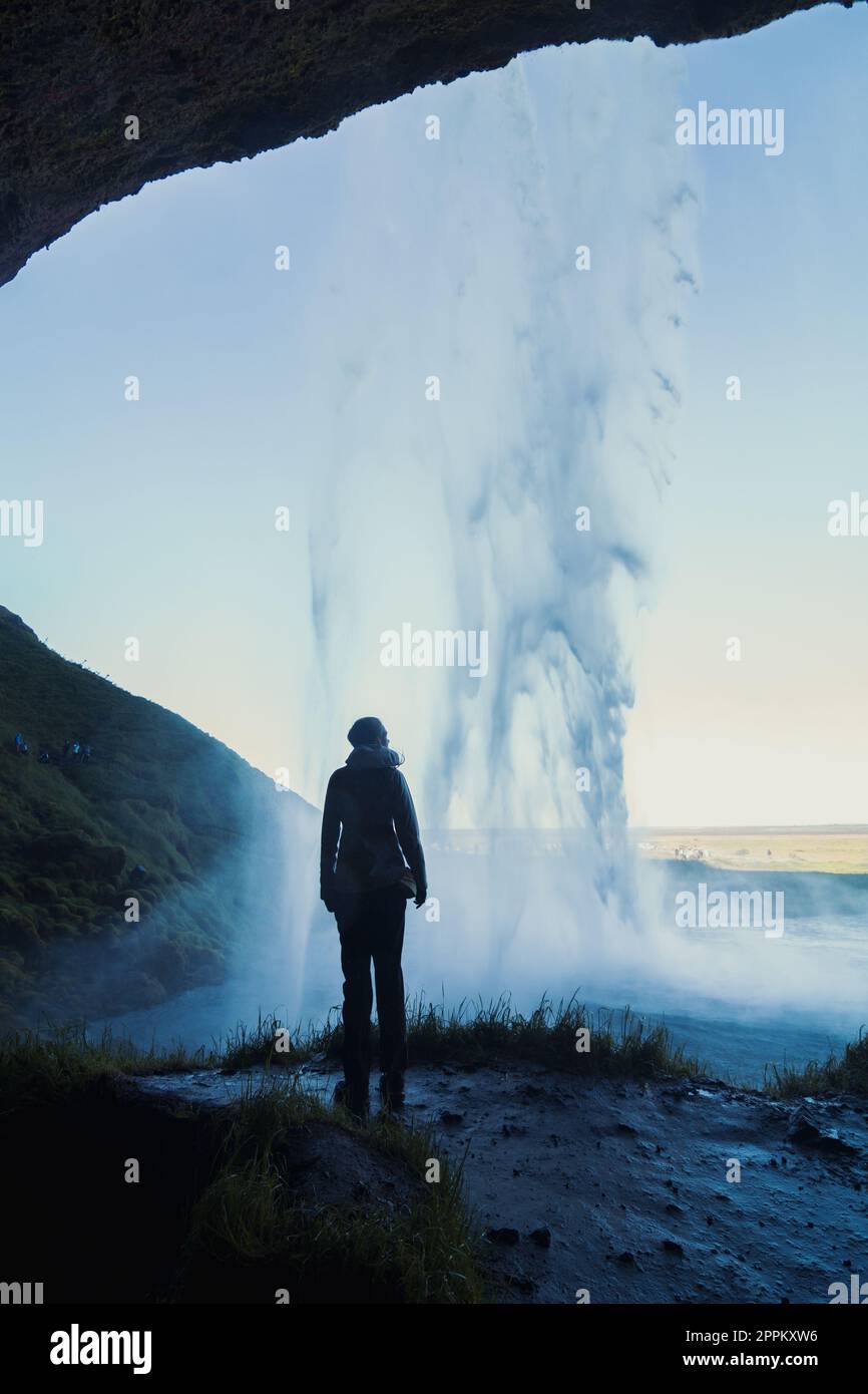 Woman under waterfall hi-res stock photography and images - Alamy