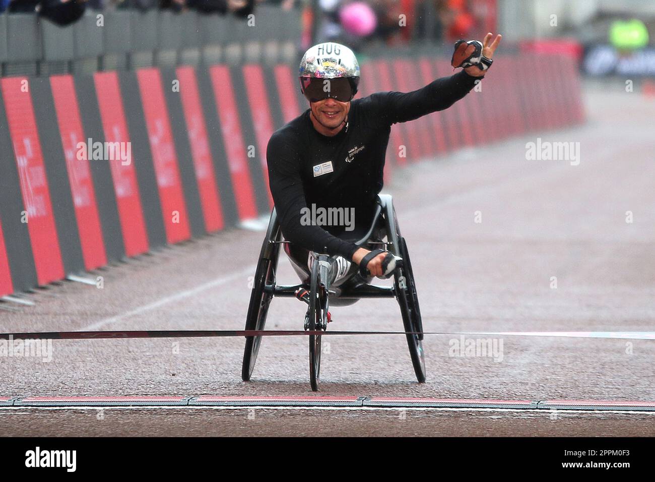 Marcel Hug of Switzerland winning the 2023 mens Wheelchair T54 TCS ...
