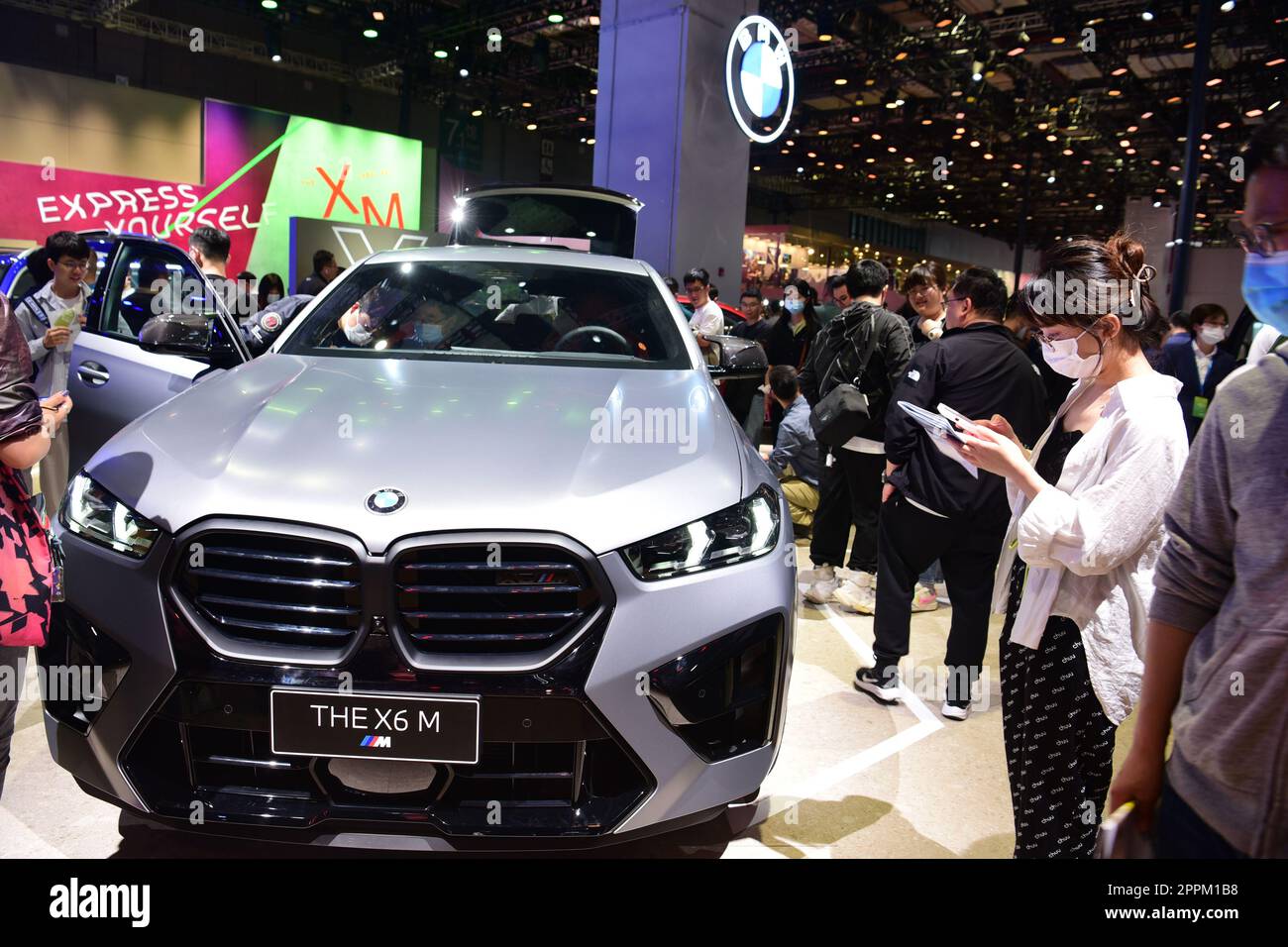 SHANGHAI, CHINA - APRIL 21, 2023 - Visitors look at THE X6 M model at ...