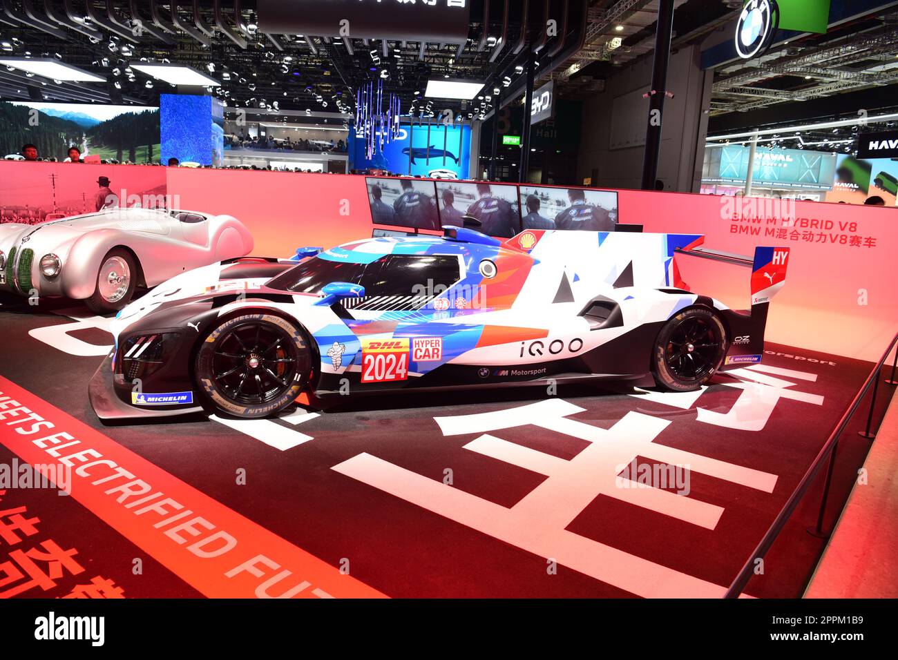 SHANGHAI, CHINA - APRIL 21, 2023 - Visitors look at a Motor Sports ...