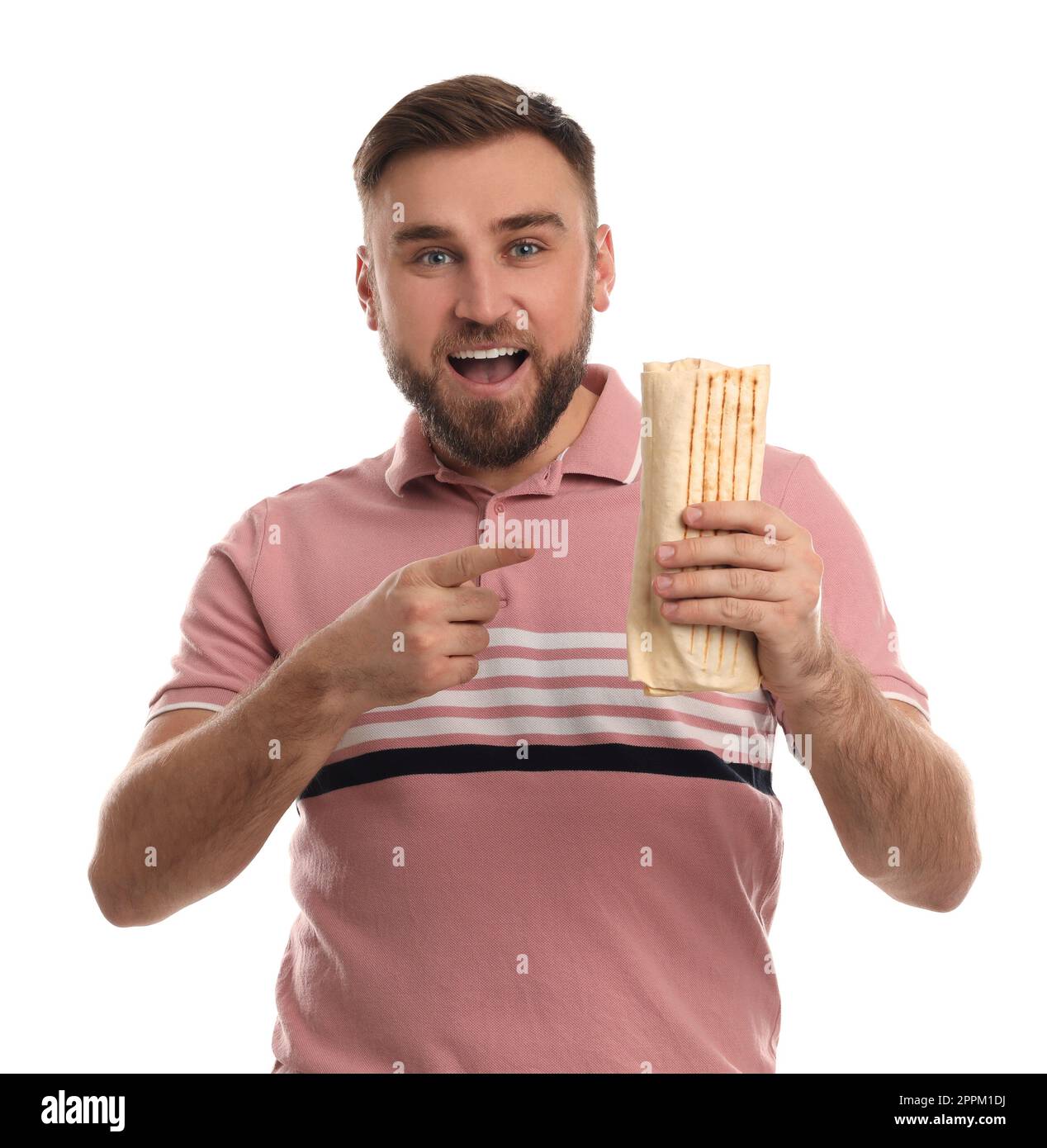 Excited young man with delicious shawarma on white background Stock ...