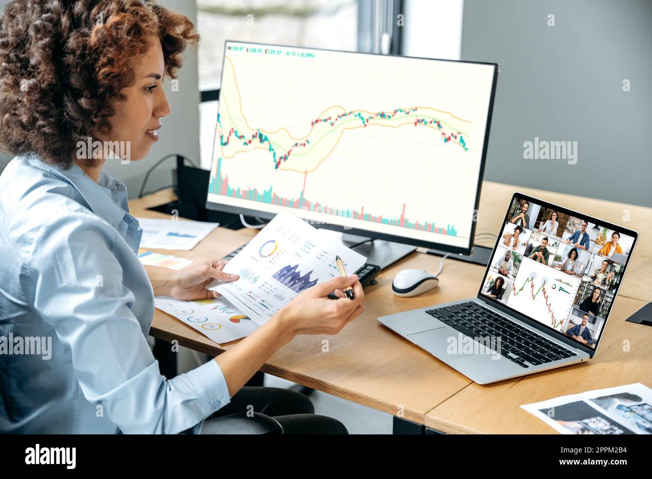 Video call of successful people.African american woman and group of ...