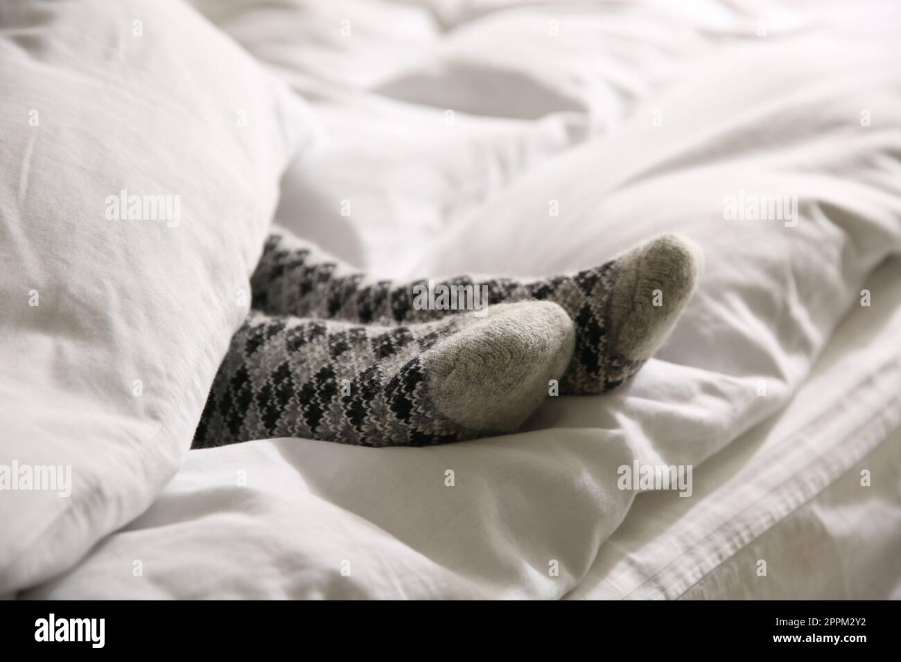 Wearing socks in bed hi-res stock photography and images - Alamy