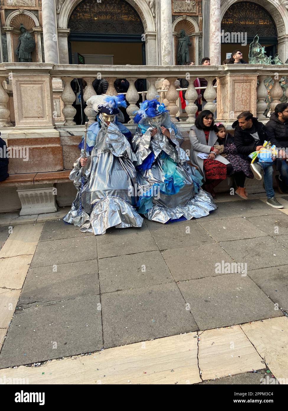 actors and family on bench at Piazza San Marco Stock Photo - Alamy