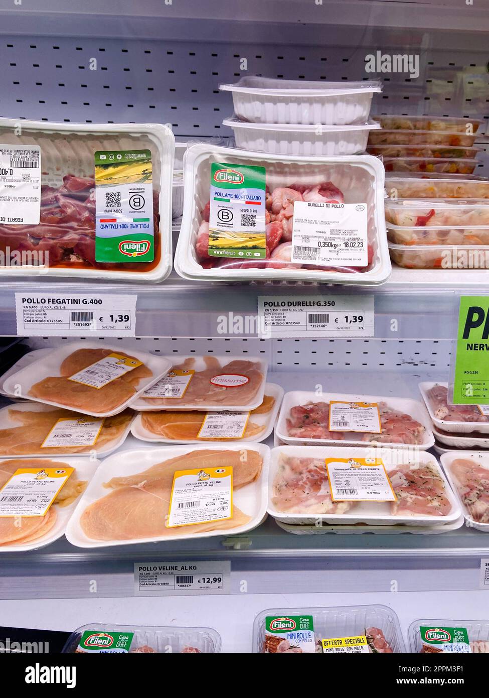 various marinated meats and prices in supermarket Stock Photo - Alamy