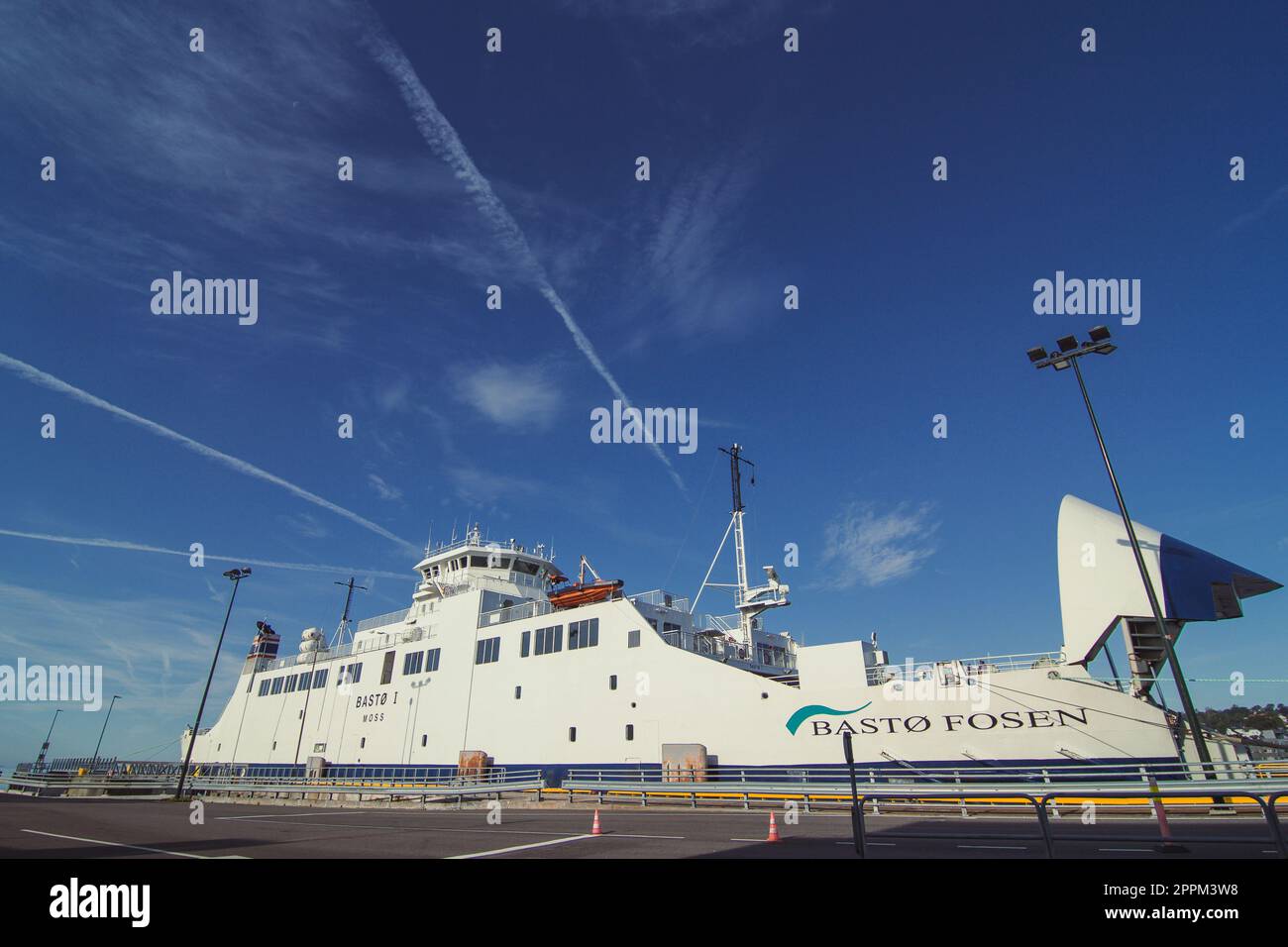 Cars carrying ship in port landscape photo Stock Photo - Alamy