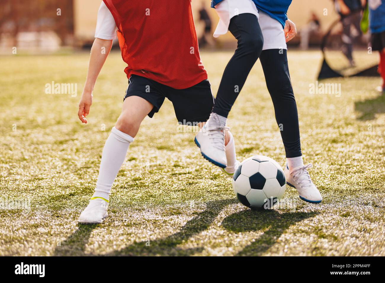 Red and Blue Soccer Players Compete in a Duel on Sunny Day. Football ...