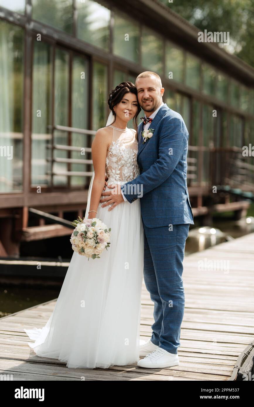 Bride and groom walking together hi-res stock photography and images ...