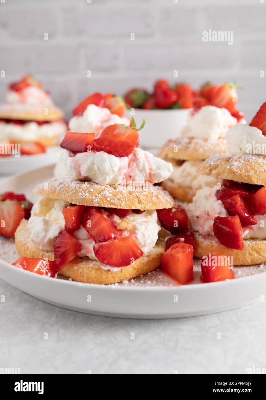Summer dessert with strawberry shortcakes. Baked traditional with short ...