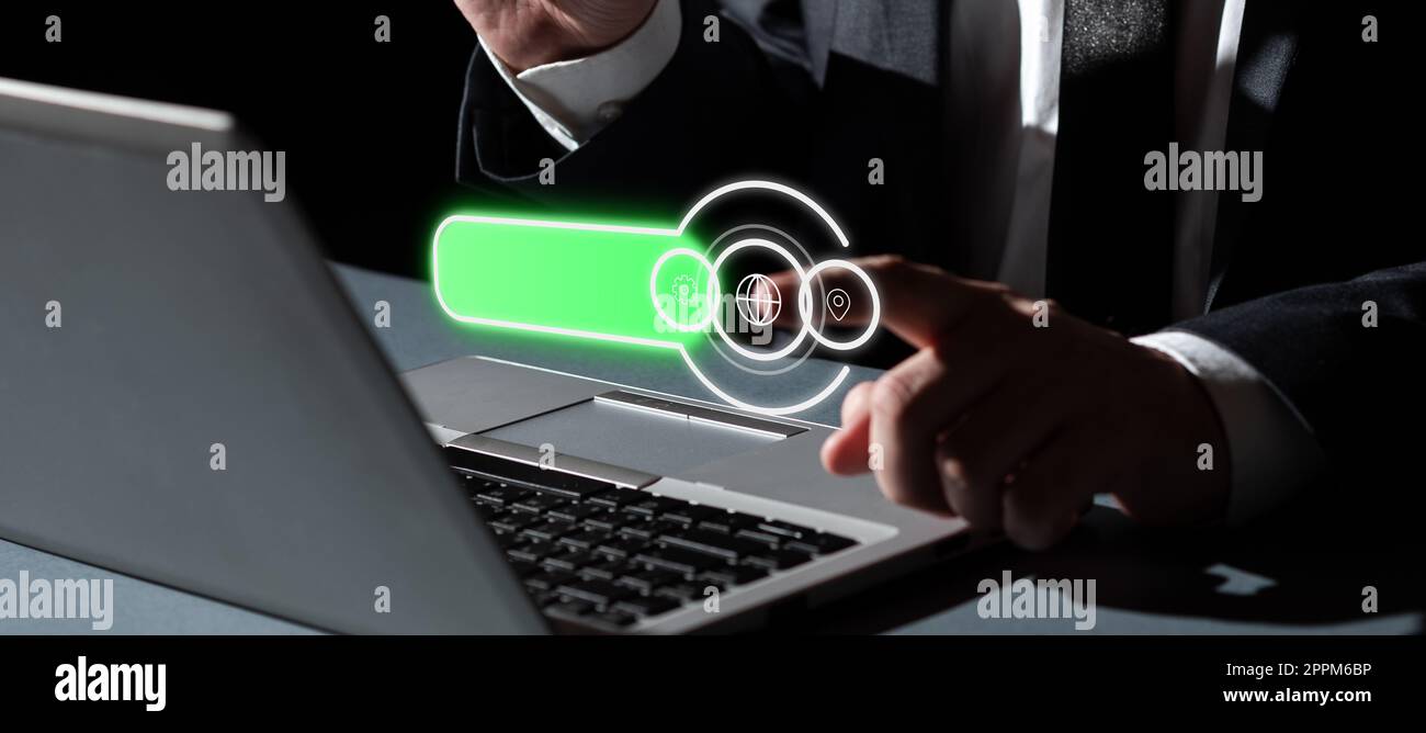 Businessman in office suit sitting at the table ant typing important ...