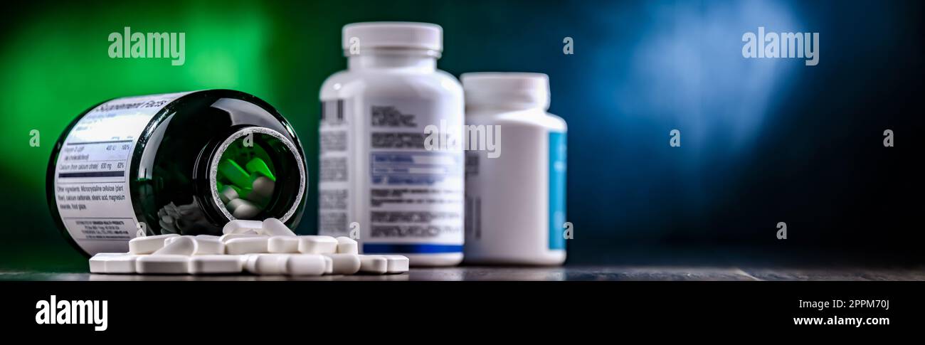 Composition with dietary supplement containers. Drug pills Stock Photo ...