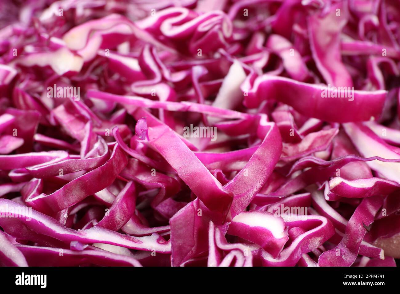 Tasty fresh shredded red cabbage as background, closeup Stock Photo - Alamy