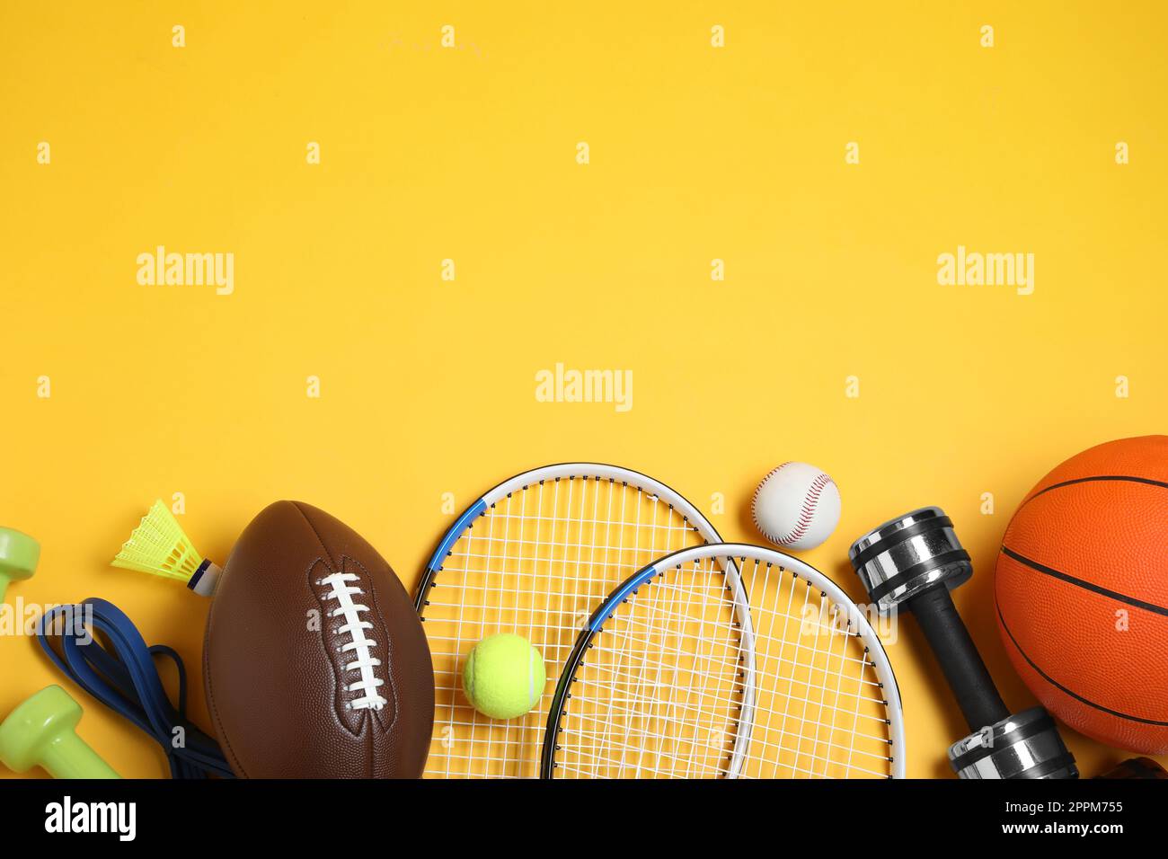 Set of different sports equipment on yellow background, flat lay. Space ...