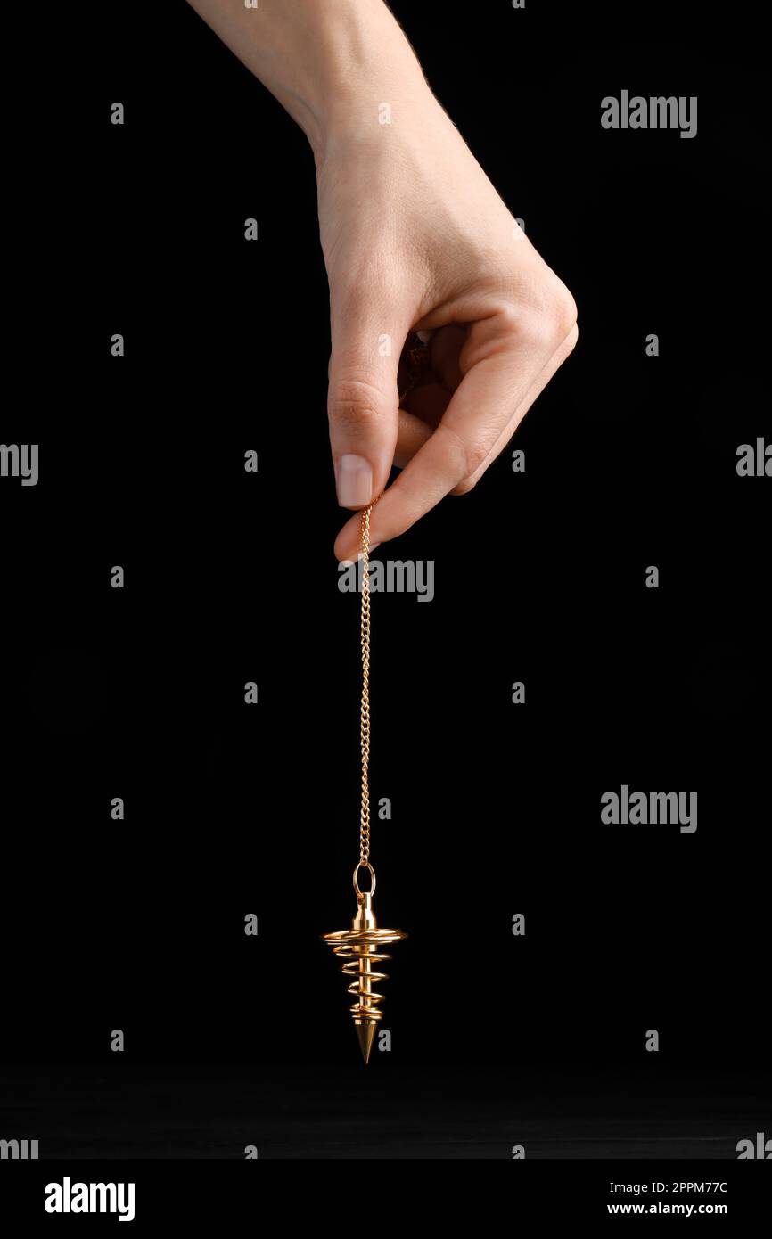 Hypnotist hypnotizing woman hi-res stock photography and images - Alamy