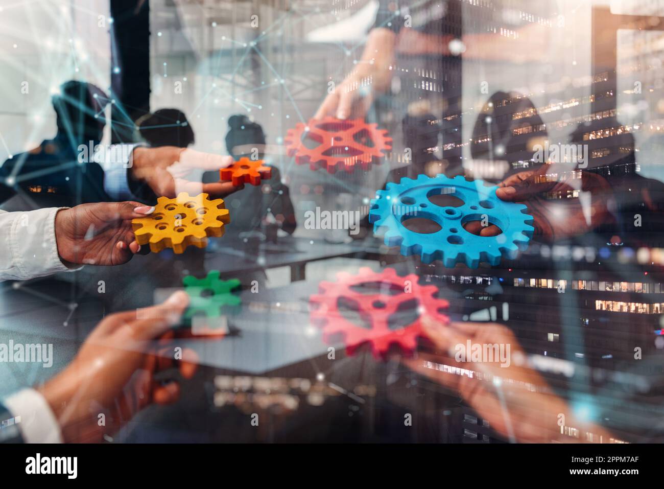 Businessteam work together and combine pieces of gears. Partnership and ...